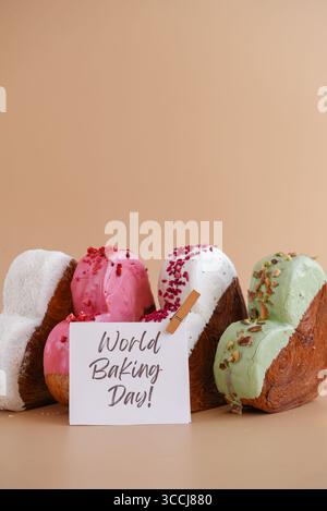 World baking day greeting card Delicious fresh croissant topped with ...