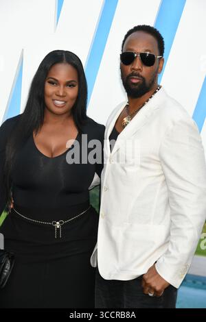 HOLLYWOOD, CALIFORNIA - AUGUST 11: (L-R) Talani Rabb and RZA attend the ...