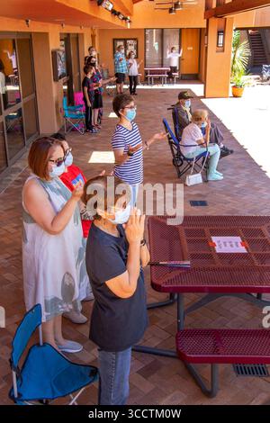 Parishioners pray in a Mass during a Nazarene of Saint Paul procession ...