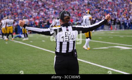 Down judge Robin DeLorenzo (134) gestures during an NFL football game ...