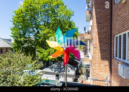 Spinning colorful pinwheel on the wind Stock Photo - Alamy