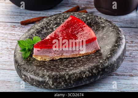 Tasta Raspberry cheesecake dessert served mint Stock Photo - Alamy