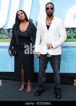 HOLLYWOOD, CALIFORNIA - AUGUST 11: (L-R) Talani Rabb and RZA attend the ...