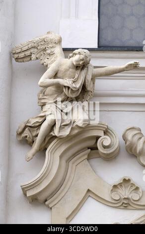 Angel on the portal of Mariahilf church in Graz, Styria, Austria Stock ...