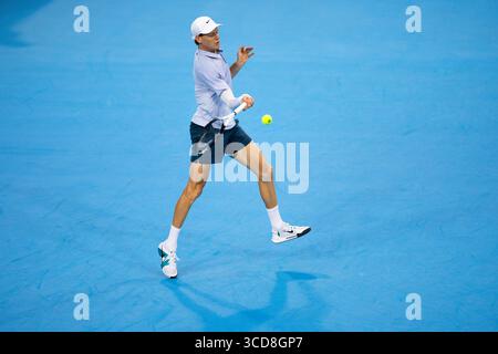 Gabriel Diallo, of Canada, returns a forehand to Taylor Fritz, of the ...