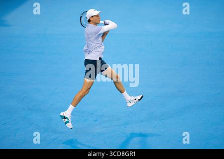Gabriel Diallo, of Canada, returns a forehand to Taylor Fritz, of the ...
