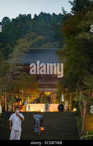 Orange glow of fires at Kurama-dera Temple Niōmon during the Kurama ...