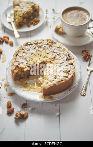 Butter cookie and a cup of Coffee on rustic wooden background. Close up ...