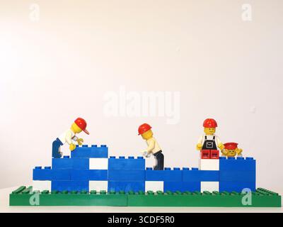 Lego men working 07 of a sequence of 07 images Stock Photo - Alamy