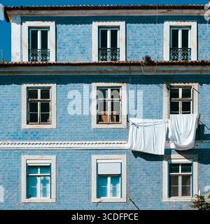 Portugal, Lisbon, Typical Portuguese Pombaline building with laundry ...