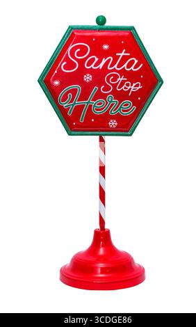 Cheerful Santa Claus in striped costume with surprised expression ...