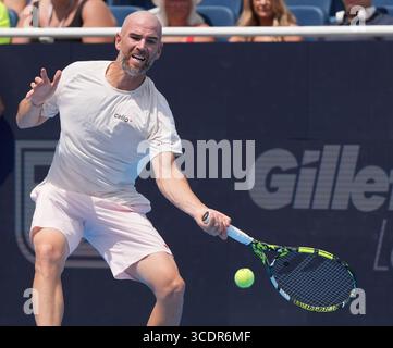 Adrian Mannarino, of France, returns a shot against Jiri Lehecka, of ...