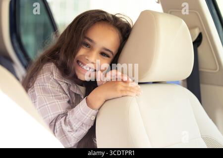 Photo of positive toothy beaming girl with perming coiffure dressed ...