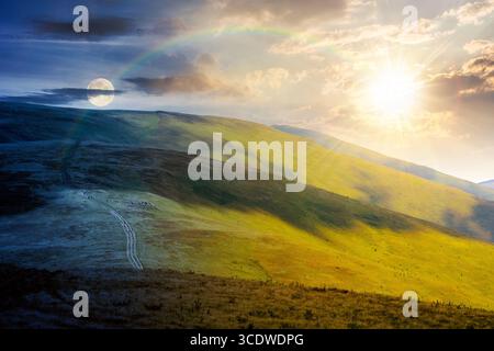 summer solstice landscape of alps. day meet night. sun and moon over ...