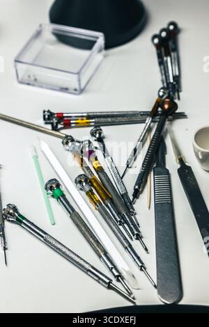 the watchmaker is repairing the mechanical watches Stock Photo - Alamy
