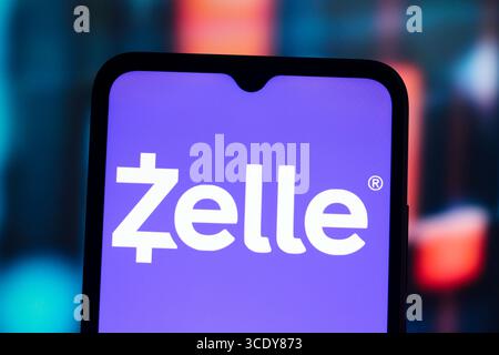 In this photo illustration a Zelle logo seen displayed on a smartphone ...