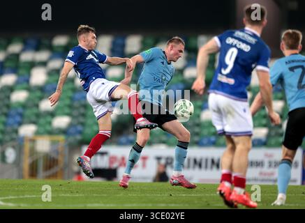 Vikingur's Ari Olsen (left) and Linfield's Charlie Allen battle for the ...