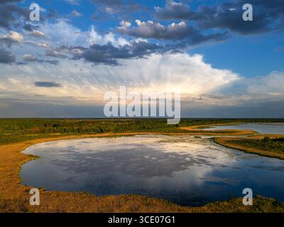 Aerial view of Lake Onamia with reflections of a thunderstorm in the ...