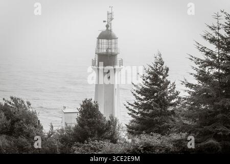 Sheringham Point Lighthouse in the fog in Shirley, BC, Canada Stock ...