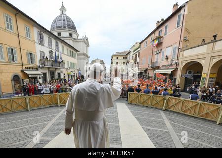 Pope Leo XIV is greeted by faithful during the weekly general audience ...