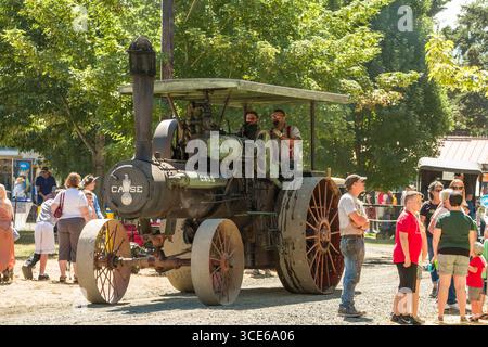 Men driving a 1923 Case 65 Horsepower steam powered tractor engine ...