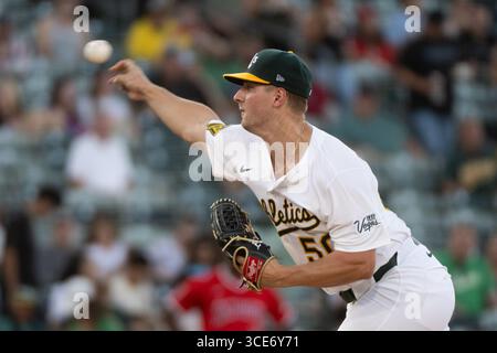 Athletics pitcher Jack Perkins throws to a Pittsburgh Pirates batter ...