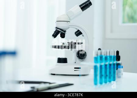 Scientist analyze biochemical samples in advanced scientific laboratory ...