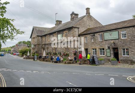 The stone built Buck Inn in the Yorkshire dales village of Malham ...