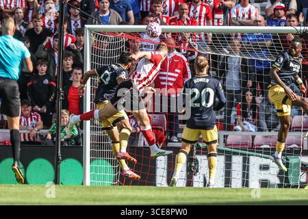 Daniel Ballard of Sunderland scores to make it 1-0 during the Premier ...
