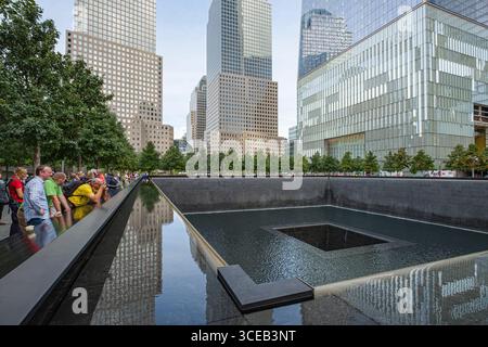 People around the 911 South Tower Pool at the National September 11 ...