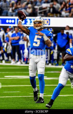Los Angeles Chargers quarterback Trey Lance (5) is sacked by ...