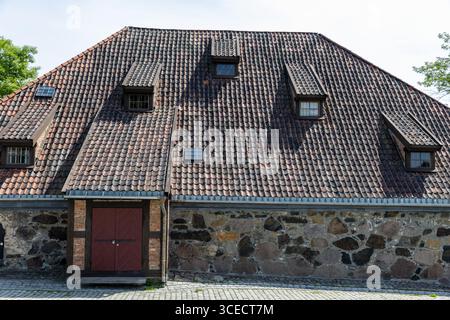 Stone house and wall at Akershus fortress in Oslo, Norway. Vidkun ...
