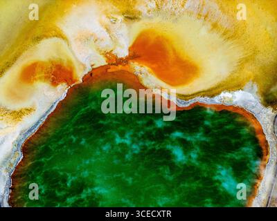 Aerial view of the vibrant Champagne Pool in Wai-O-Tapu geothermal park ...