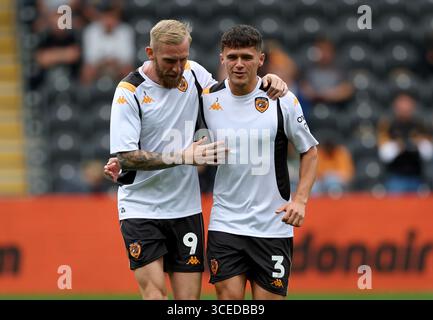 Hull City's Oliver McBurnie (left) celebrates with Liam Millar after ...