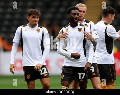 Hull City's Kyle Joseph (left) and Leicester City's Wout Faes battle ...