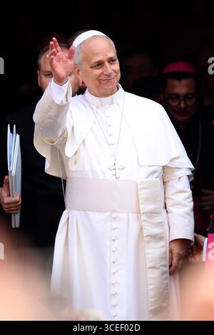 Pope Leo XIV greets the faithful during his weekly general audience in ...