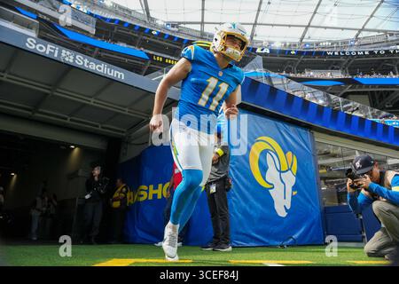 Los Angeles Rams kicker Cameron Dicker kicks an extra point during the ...