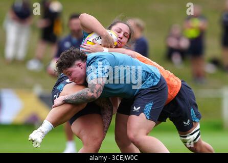 England's Hannah Botterman (right) during a team run at SGS College ...