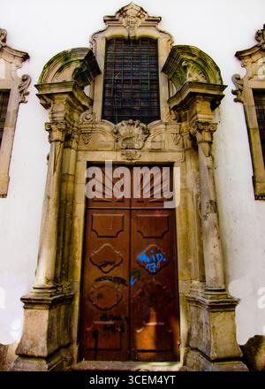 A detailed close-up of an ornate historic European building facade ...