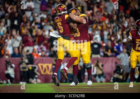 Washington Commanders center Tyler Biadasz (63) and guard Chris Paul ...