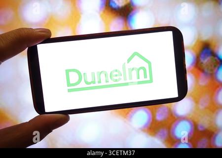 In this photo illustration, the Dunelm Group logo is displayed on a ...