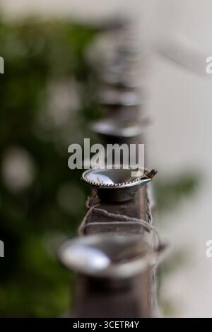 The oil lamps in small outdoor altar of City Pillar Shrine in Bangkok ...