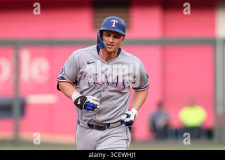 Texas Rangers' Corey Seager runs the bases after hitting a home run ...