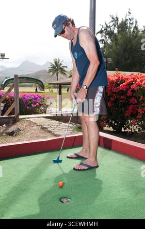 Man playing mini-golf, Bellows Air Force Station, Waimanalo, Oahu ...