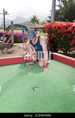 Man playing mini-golf, Bellows Air Force Station, Waimanalo, Oahu ...