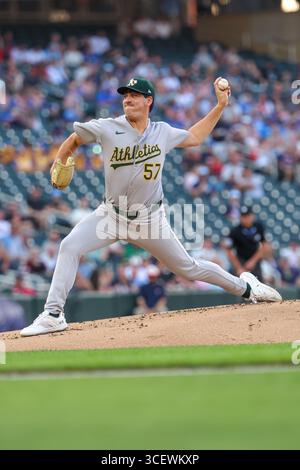 Athletics starting pitcher Jacob Lopez throws against the Seattle ...