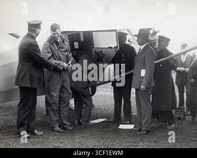 Roosevelt Field, New York: May 20, 1927 Captain Charles Lindbergh with ...
