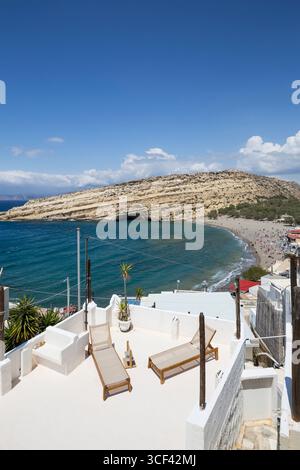 Famous Matala beach with caves, known for hippies in the 70's. View of ...