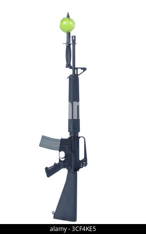 Green apple impaled on a bayonet attached to a AR-15 rifle Stock Photo ...