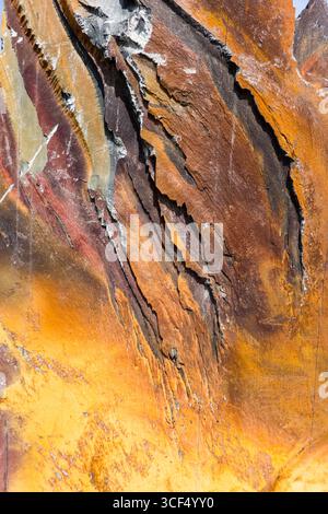 Different colored layers of a natural stone Stock Photo - Alamy